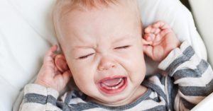 Teething Fever: A Mom's Guide to Signs, Symptoms & Teething Remedies